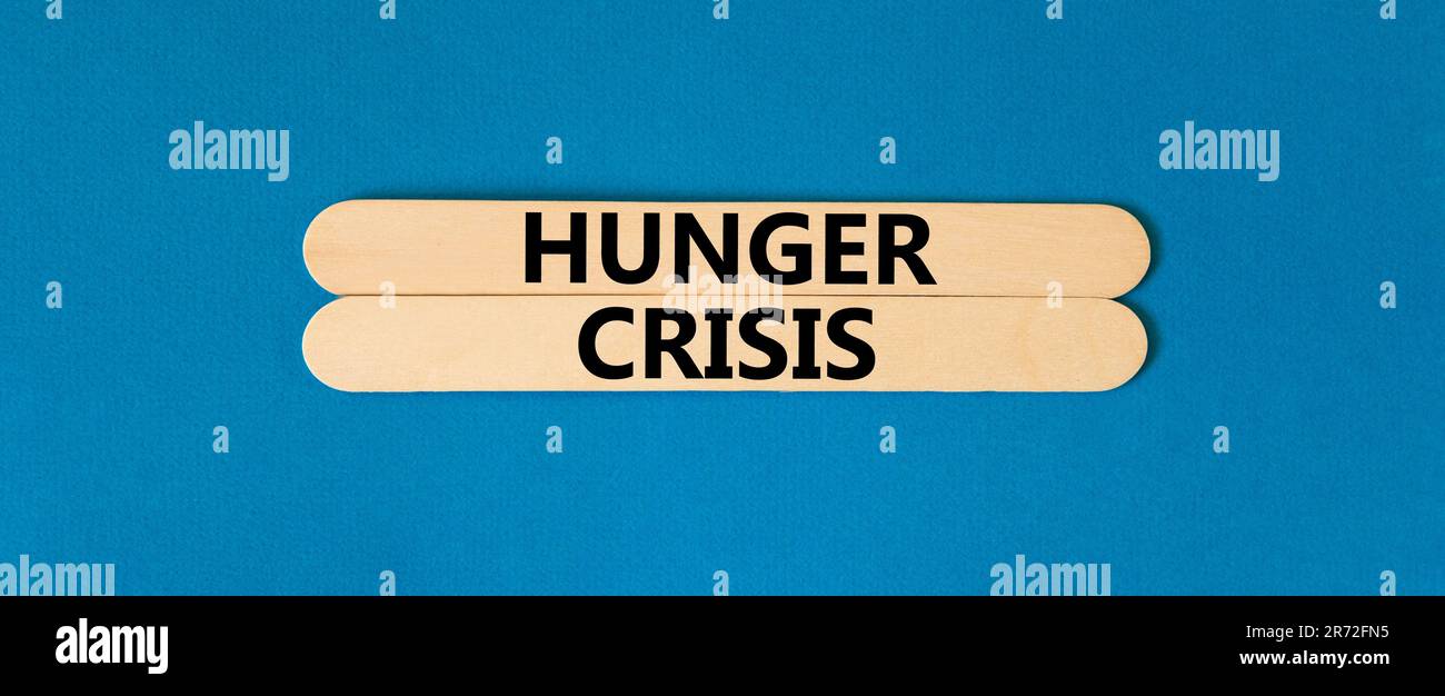 Hunger crisis symbol. Concept words Hunger crisis on beautiful wooden ...