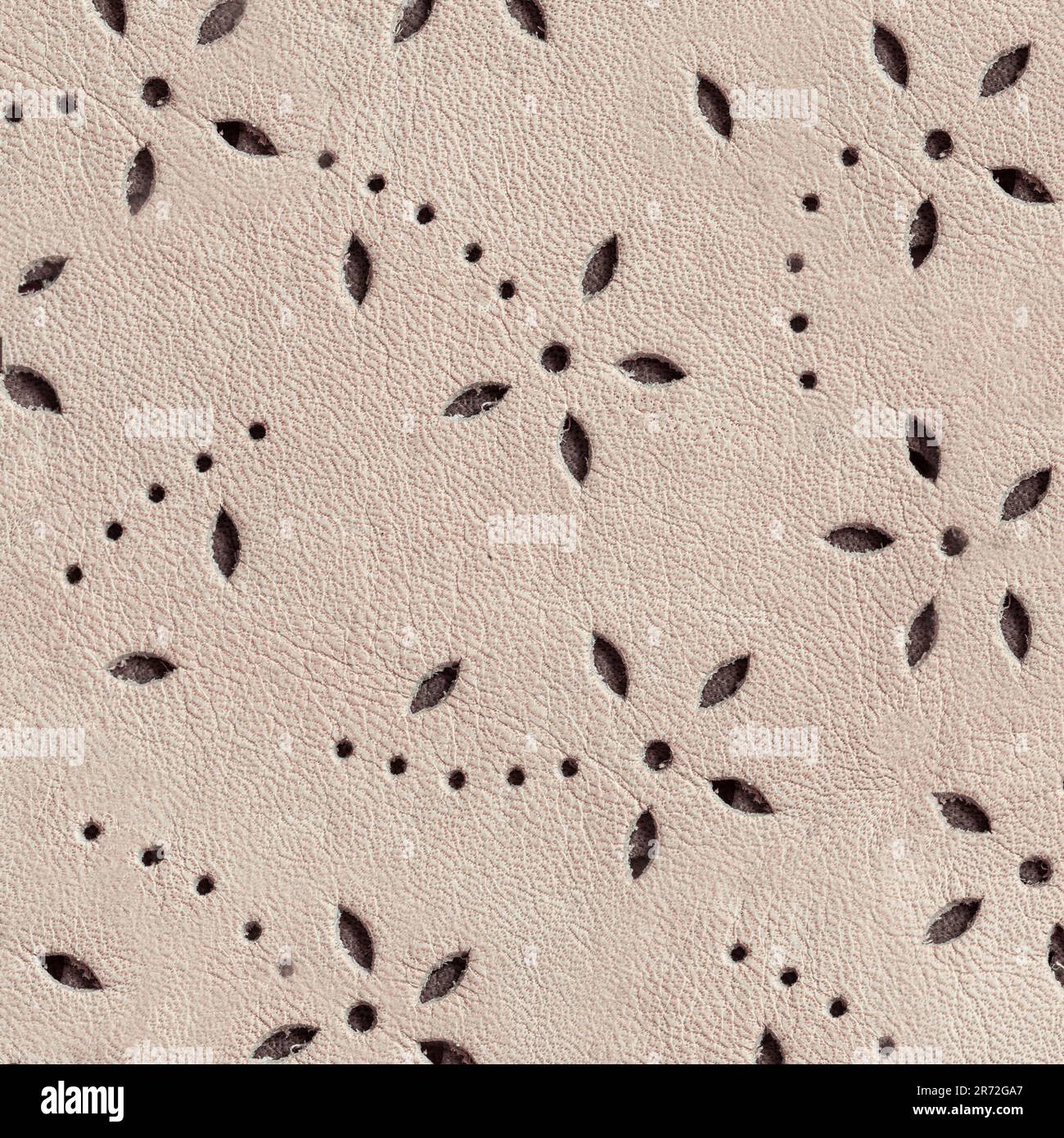 Texture of perforated genuine leather, embossed floral pattern. Modern ...