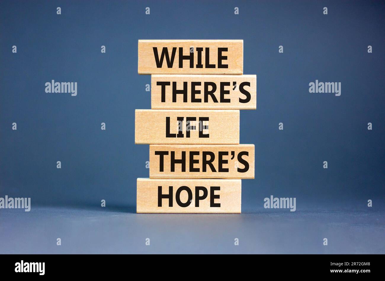 Life and hope symbol. Concept word While there is life there is hope on ...