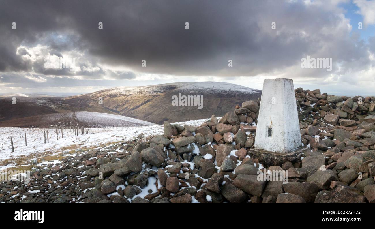 Hedgehope hill summit trig point and windshelter, with Cheviot in the ...