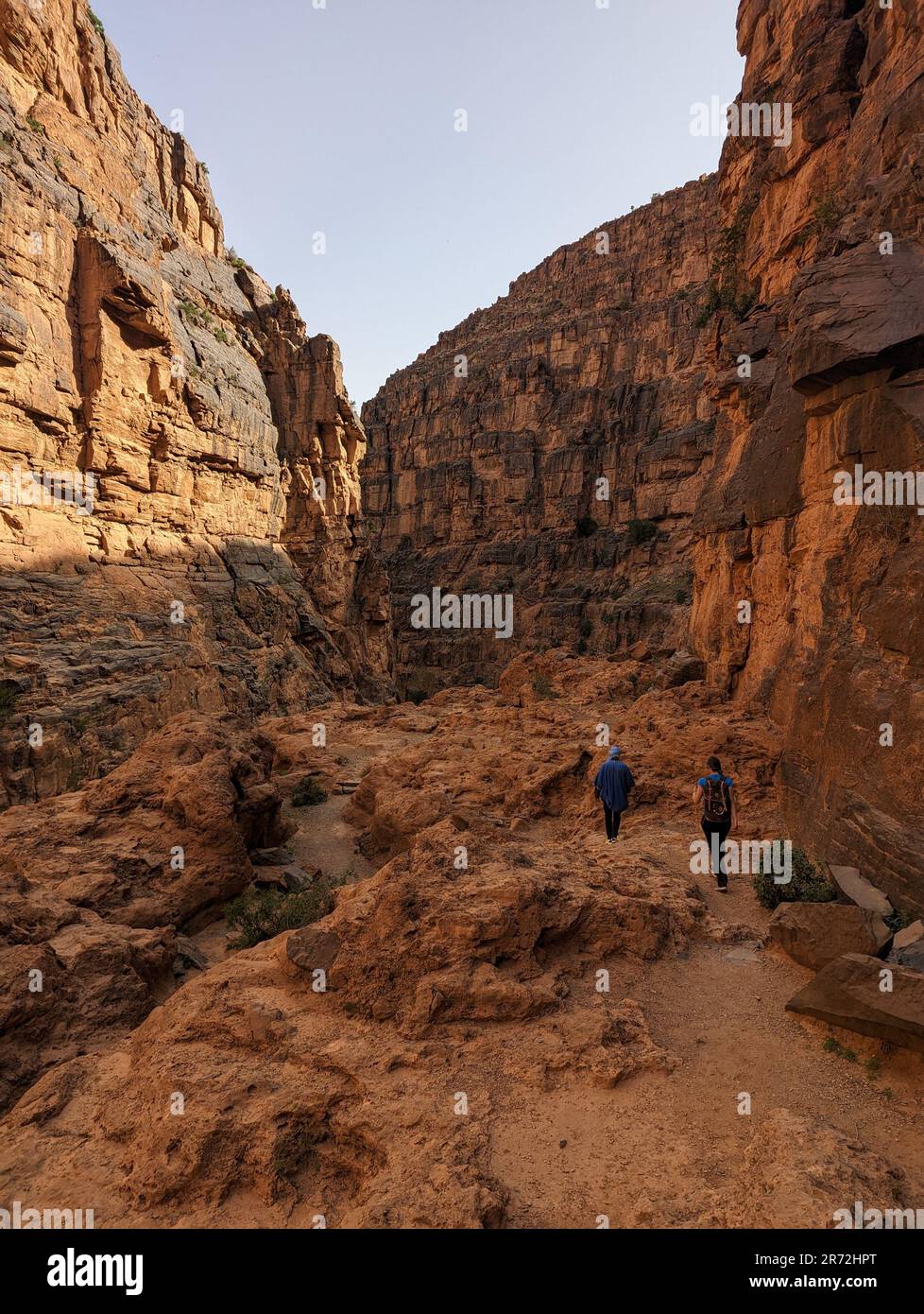 Hiking through the iconic Amtoudi canyon in the Anti-Atlas, Morocco ...