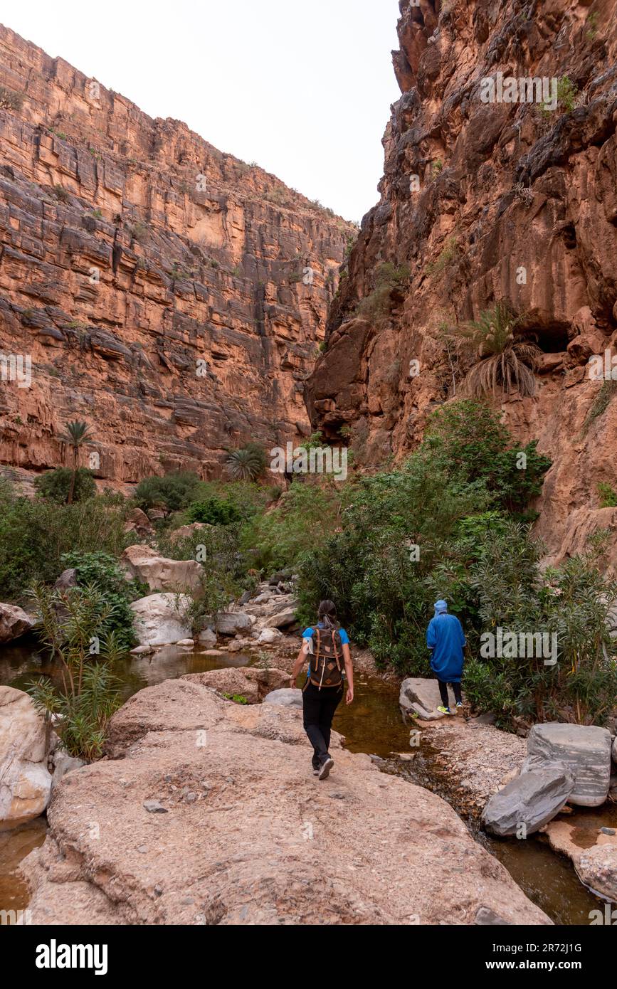 Hiking through the iconic Amtoudi canyon in the Anti-Atlas, Morocco ...