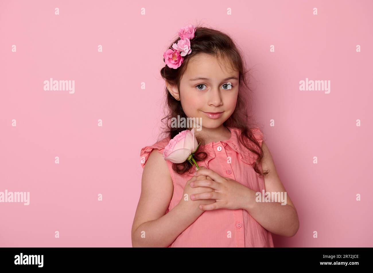 Authentic Caucasian beautiful elegant little girl in pink dress ...