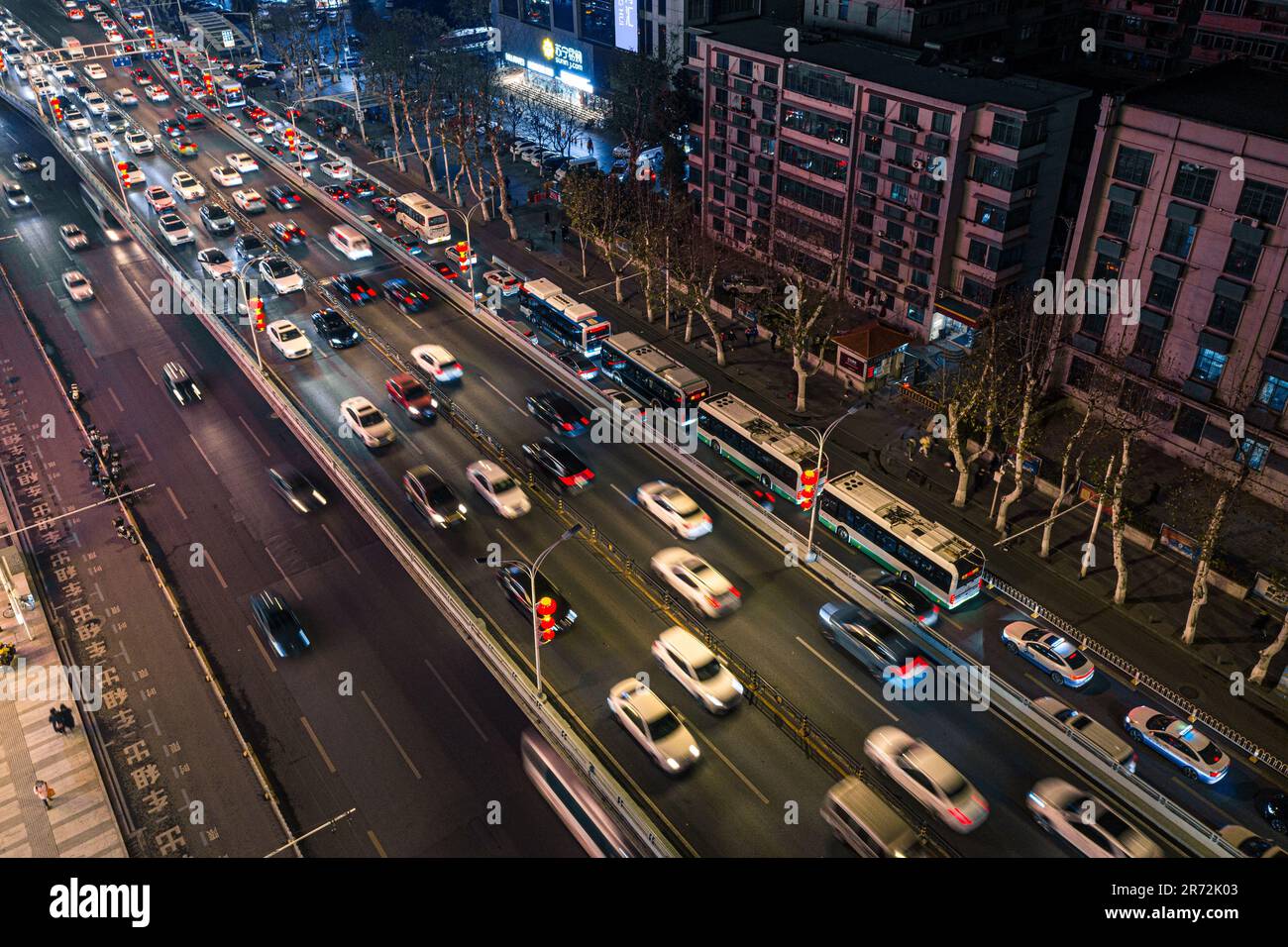 An aerial view of a bustling metropolis featuring a wide and busy ...