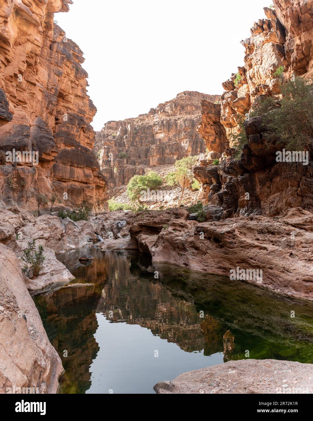 Hiking through the iconic Amtoudi canyon in the Anti-Atlas, Morocco ...