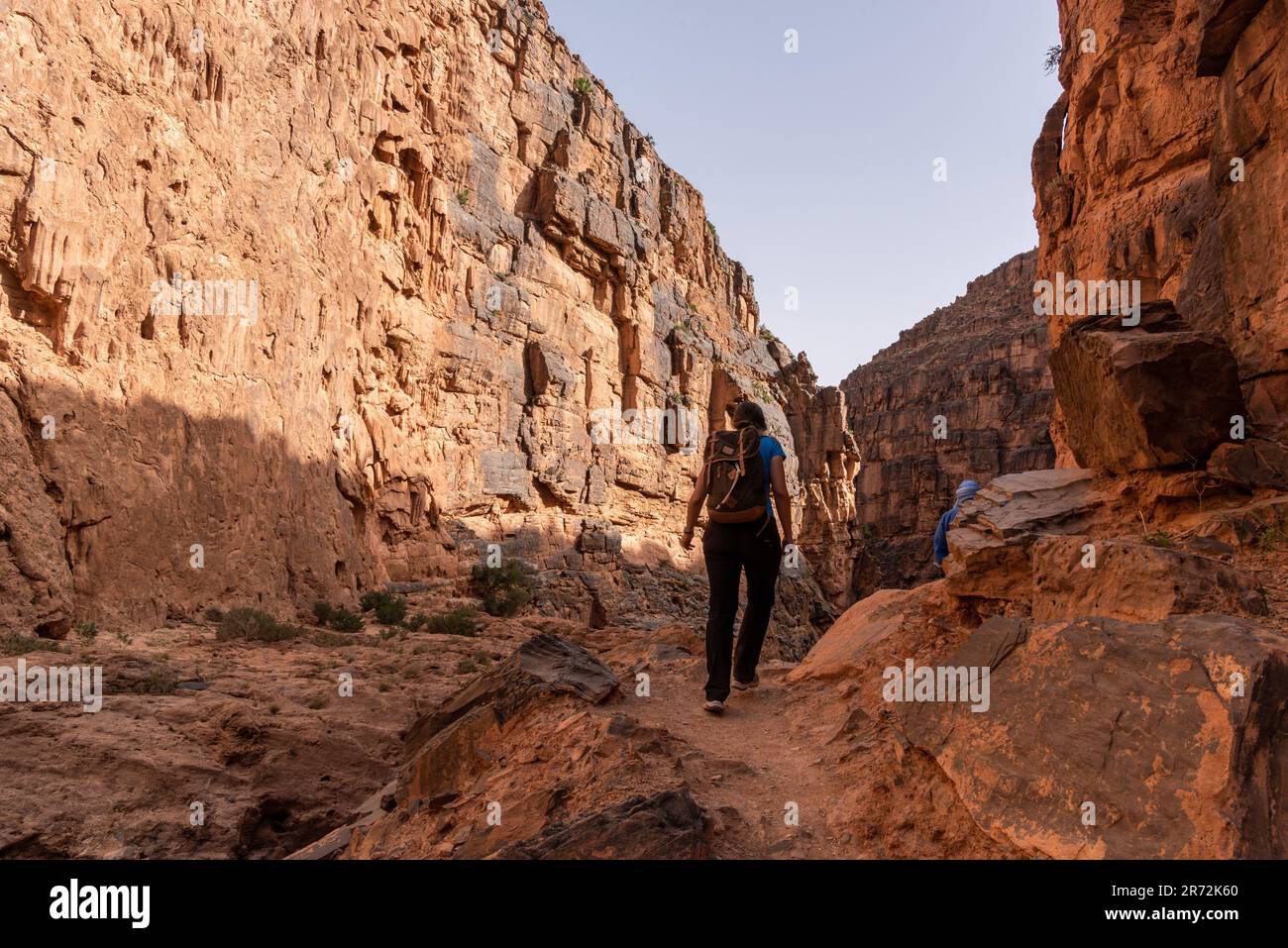 Hiking through the iconic Amtoudi canyon in the Anti-Atlas, Morocco ...
