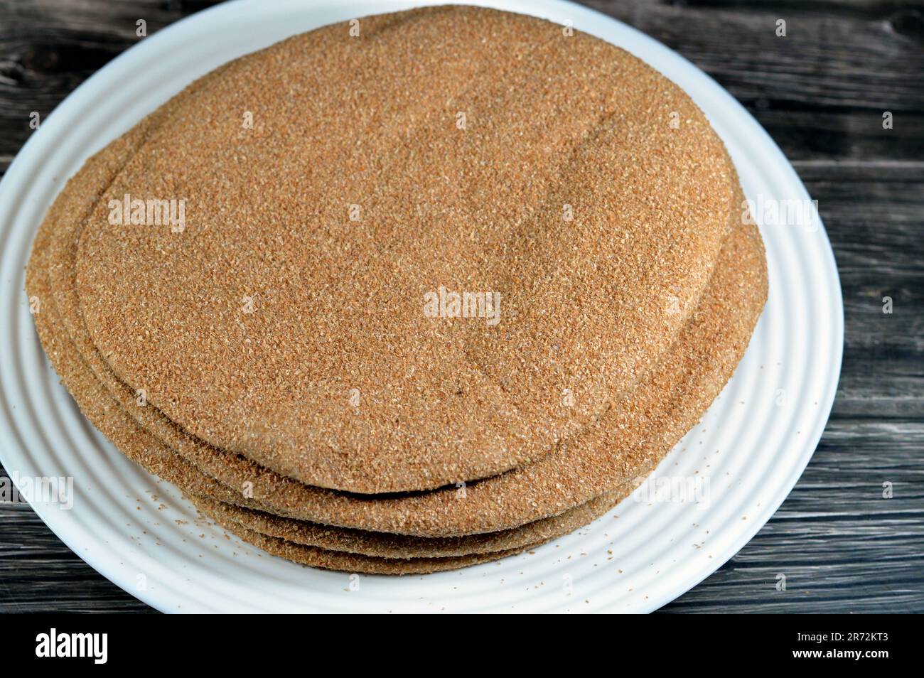 Brown baked pitta bread flatbread made mainly in bran, Bran breads used ...