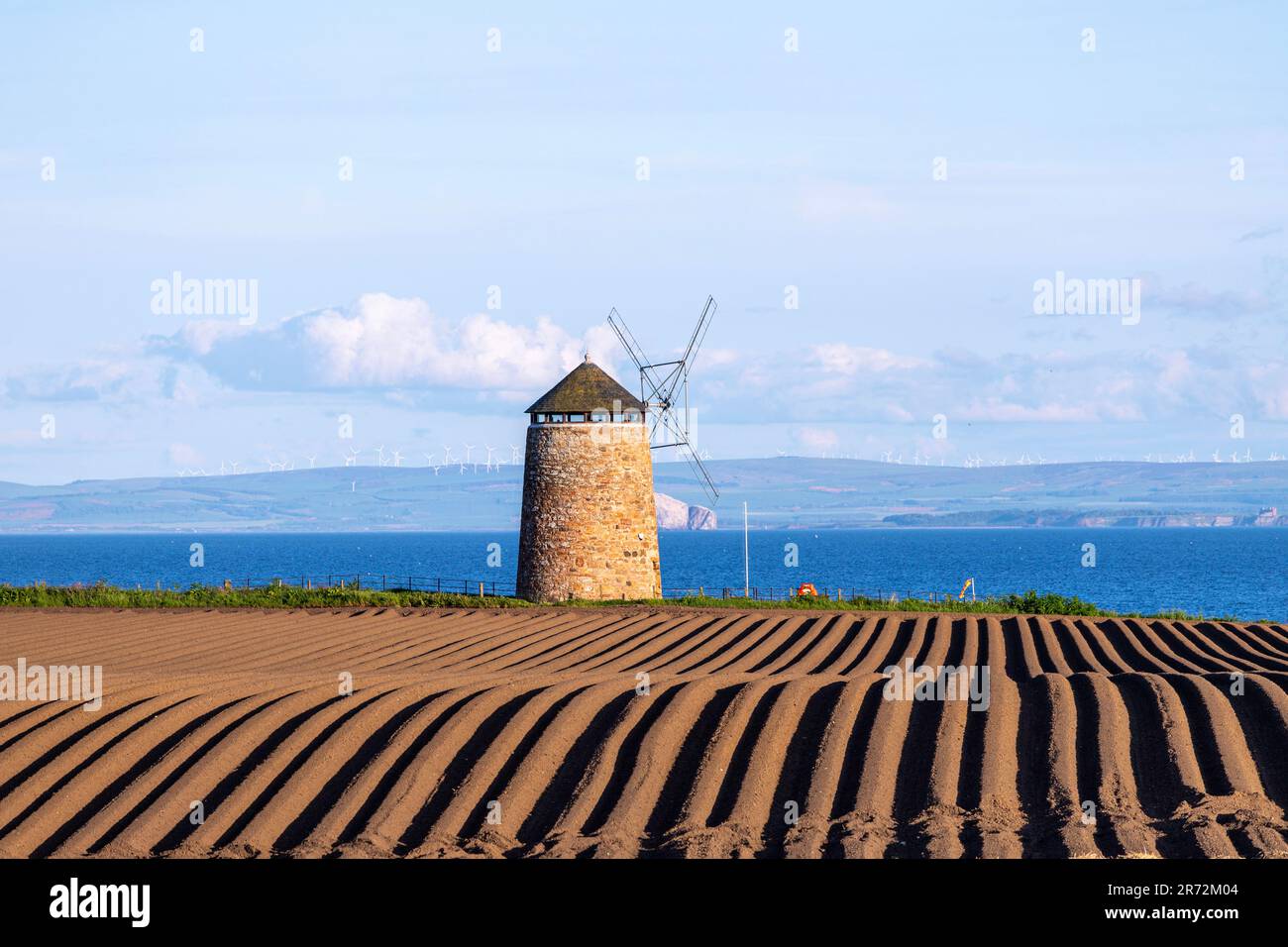 St Monans Windmill, pre-planting field, St Monans, Fife, Scotland, UK ...