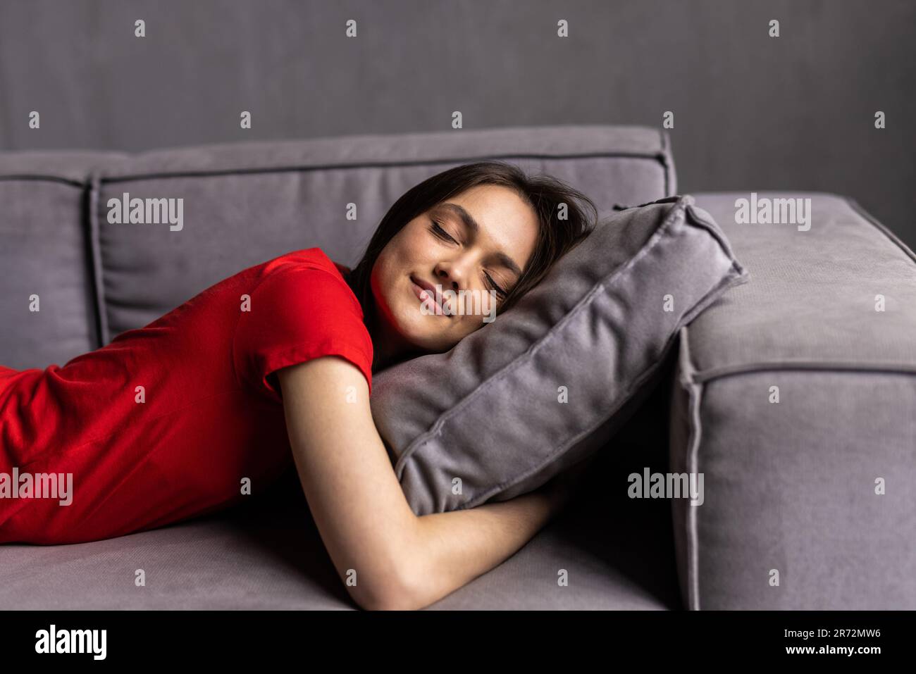 woman sleeping on couch at home Stock Photo - Alamy