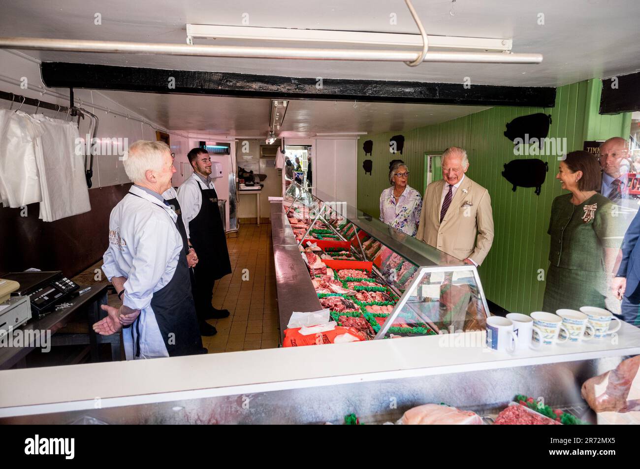 King Charles III in a family butchers shop during a visit to Pickering ...