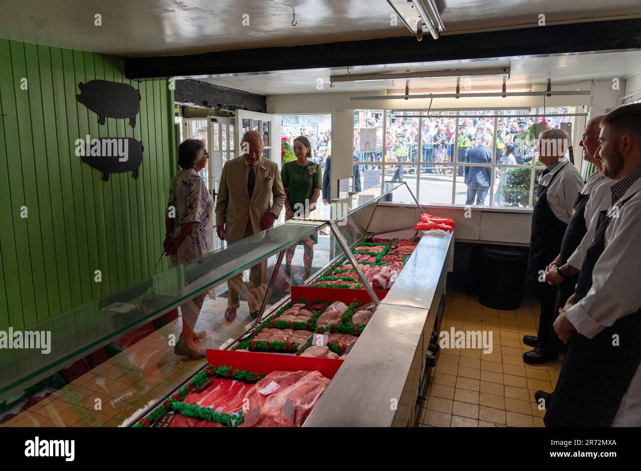 King Charles III in a family butchers shop during a visit to Pickering ...