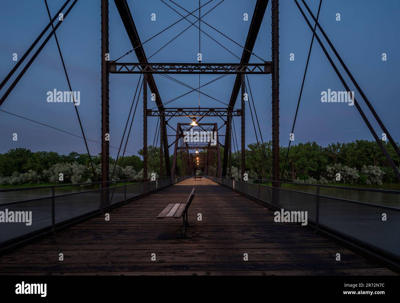 Night view of a pedestrian bridge crossing the Missouri River at Fort ...