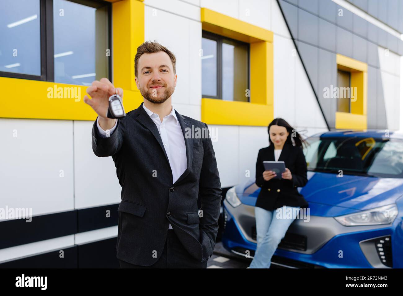 Male shop assistant clothes shop hi-res stock photography and images ...