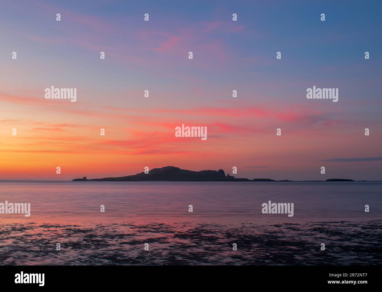 Colourful sunset sky above Ireland's Eye from Claremont Beach Stock ...