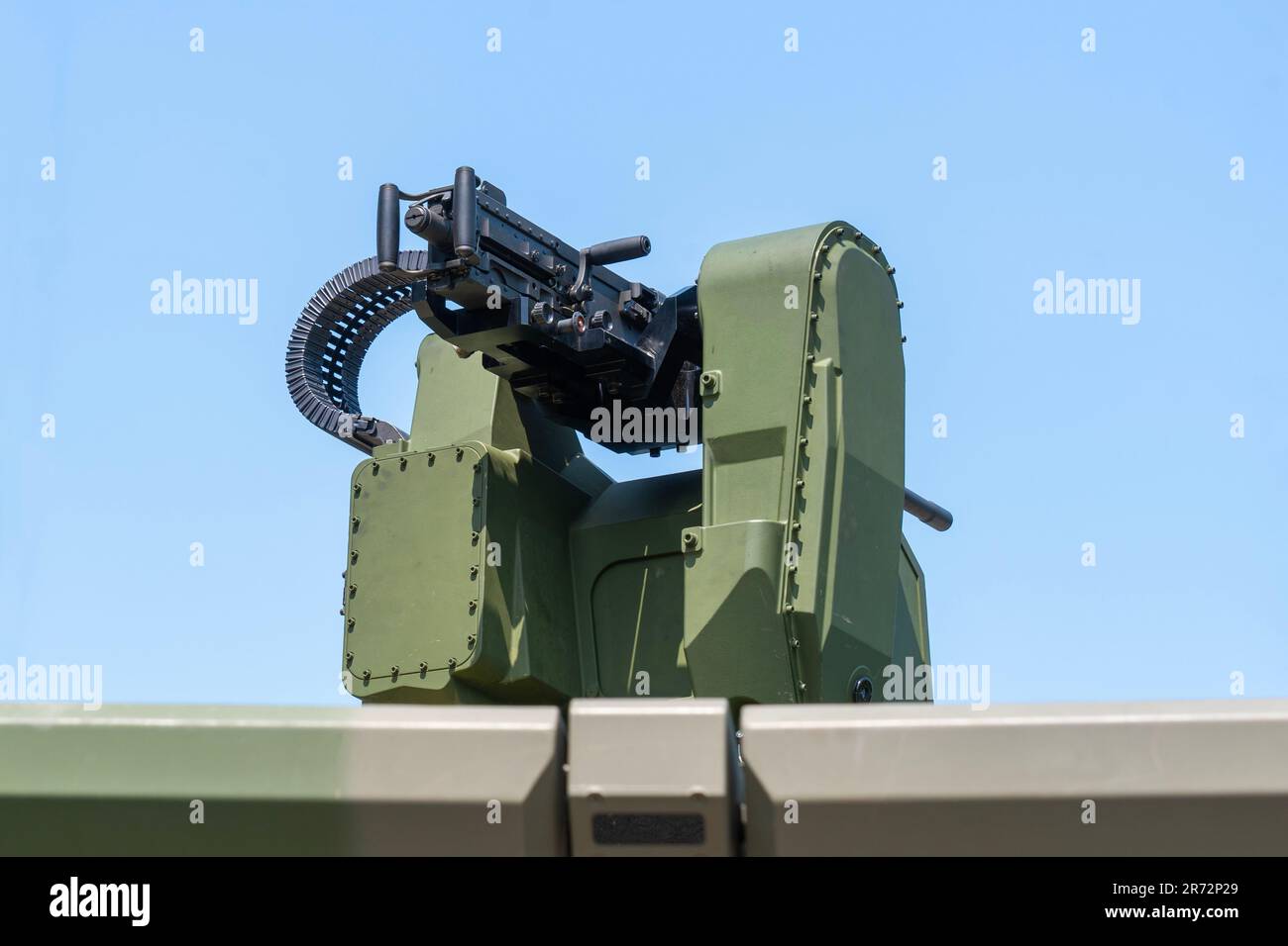 .50 cal M2 Browning heavy machine gun on top of a green camouflage ...