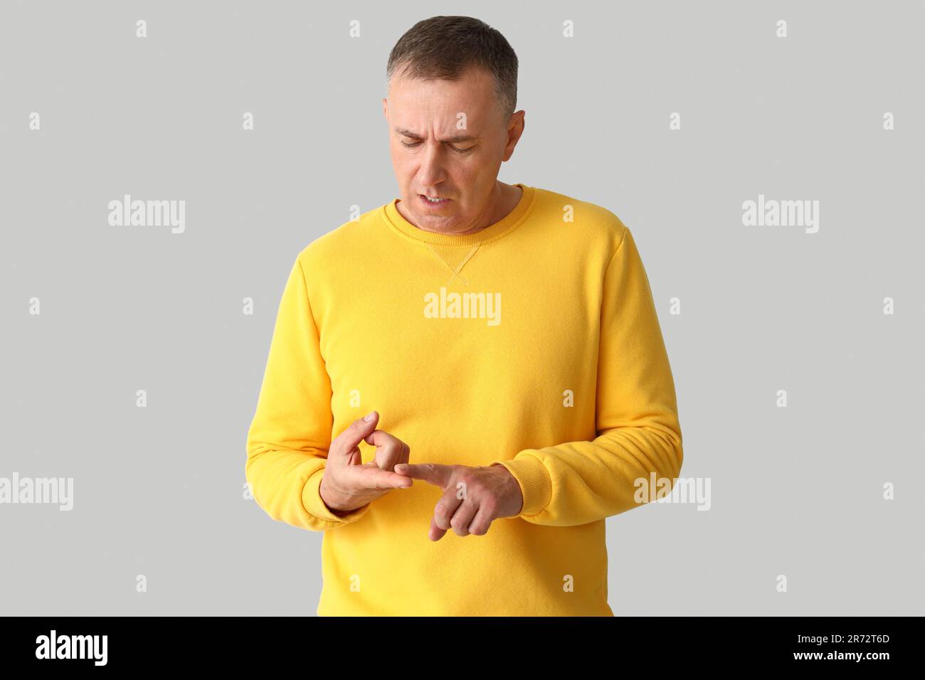 Portrait middle aged man counting hi-res stock photography and images ...