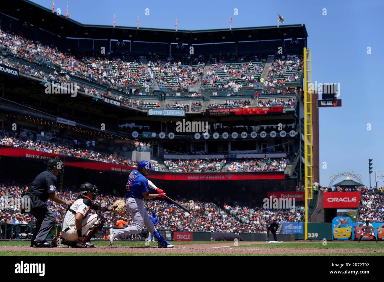 Chicago Cubs' Christopher Morel (5) bats in front of umpire Nestor Ceja ...