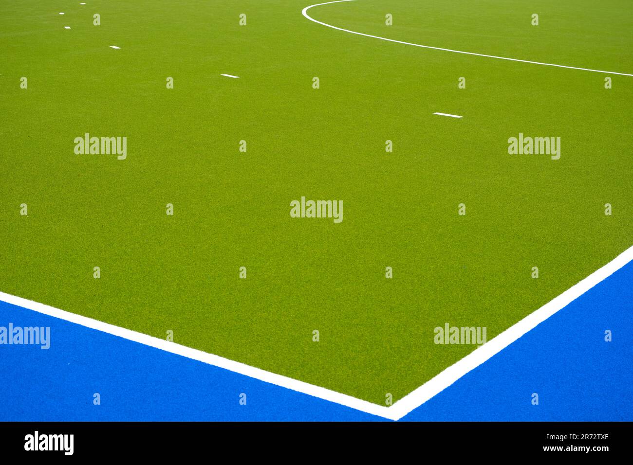 Green and blue artificial turf sports field Stock Photo - Alamy
