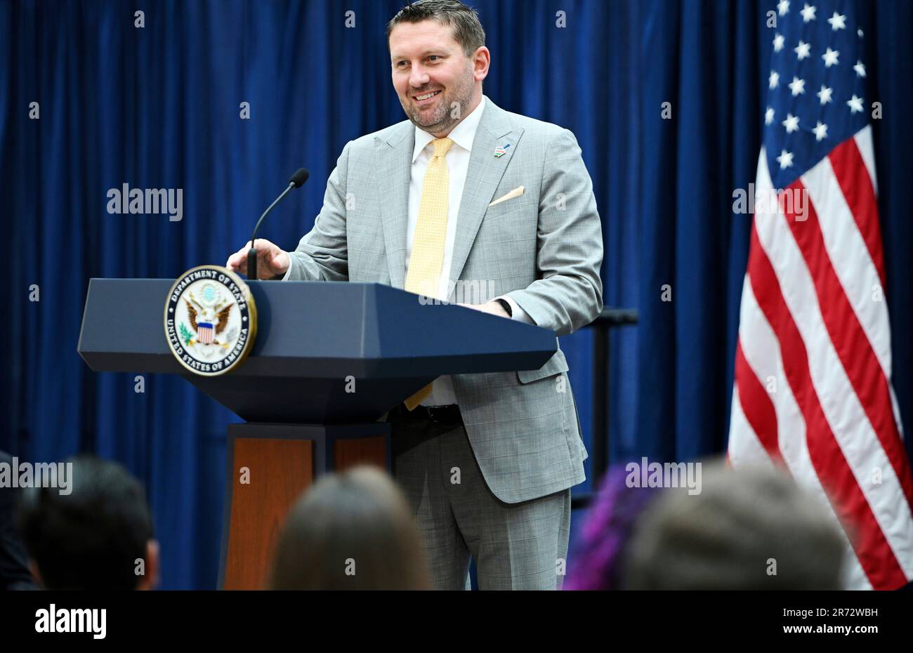 Shawn VanDiver, #AfghanEvac founder, speaks during a memorandum of understanding (MOU) signing ...