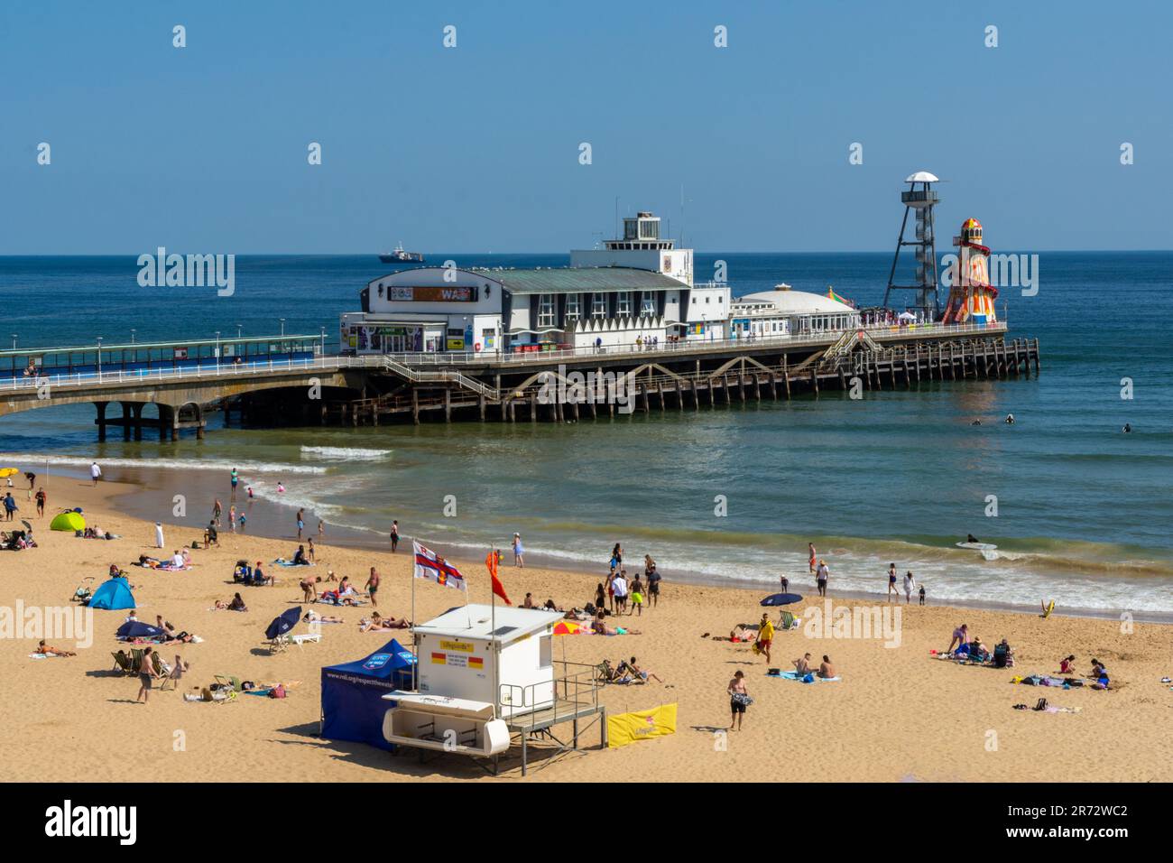 Bournemouth, UK - June 5th 2023: People around the RNLI lifeguard tower ...