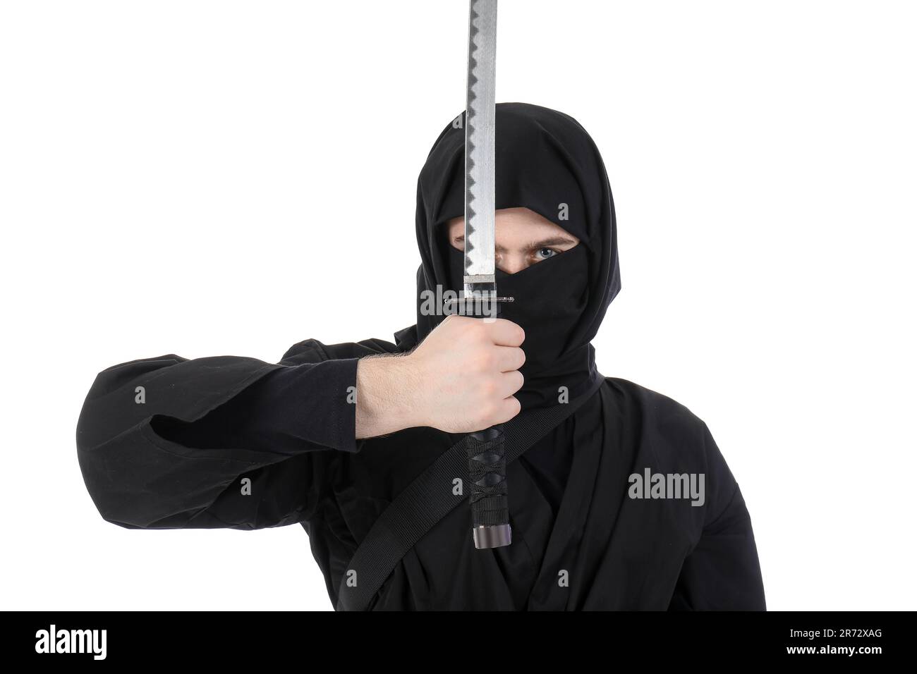 Male ninja with sword on white background Stock Photo - Alamy