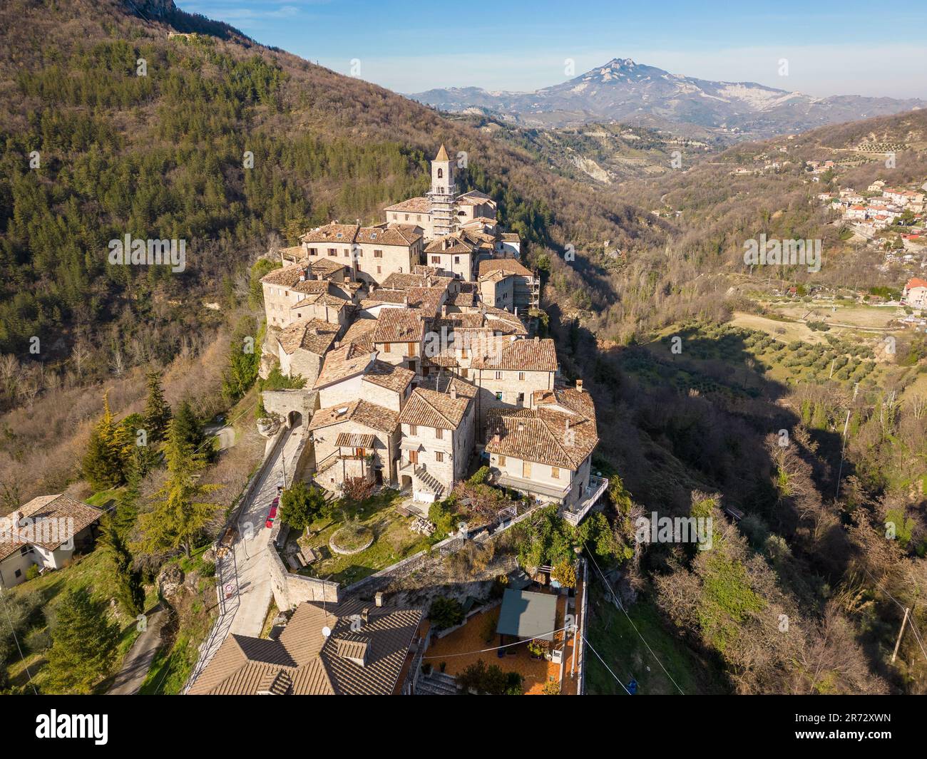 An aerial view of the historic Castle Trosino and nearby cliffs in ...