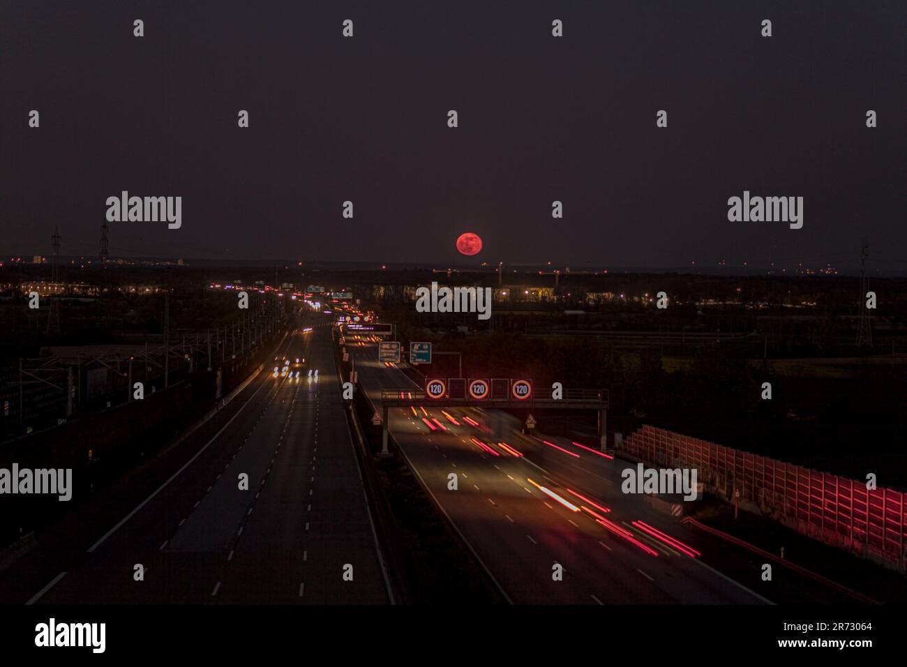 Image of Pink Moon rising over a German highway in April 2021 in ...