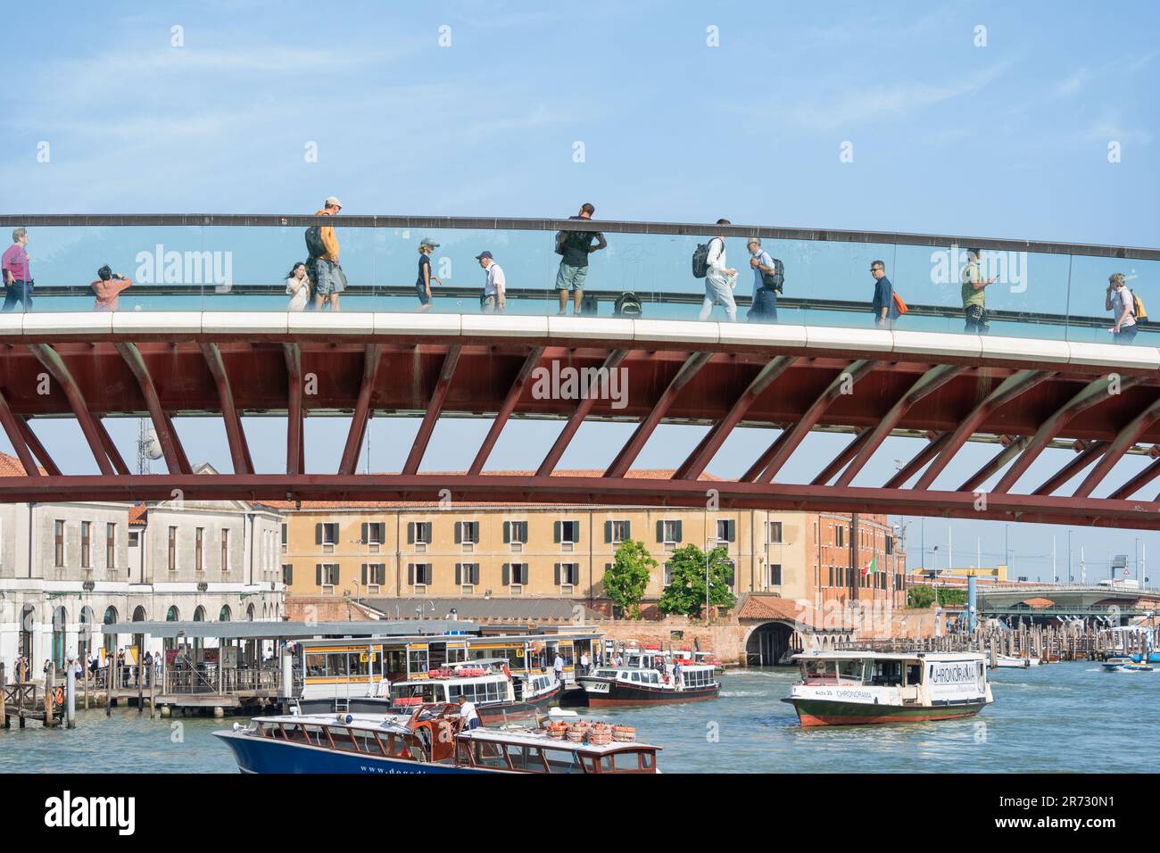 Venice, Italy - May 2023: Tourists walking on Constitution Bridge ...