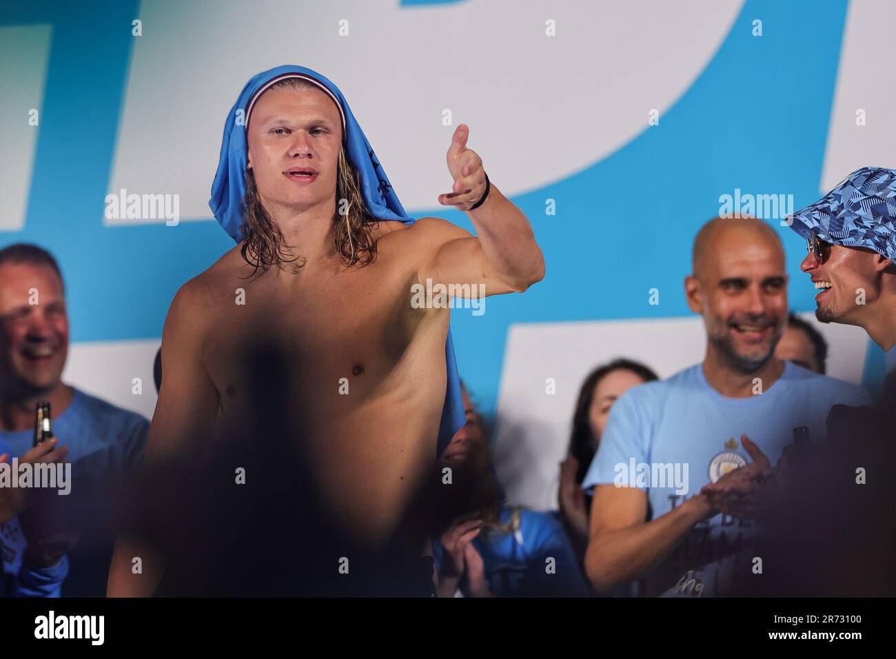 Erling Håland #9 of Manchester City on stage without a top on during ...