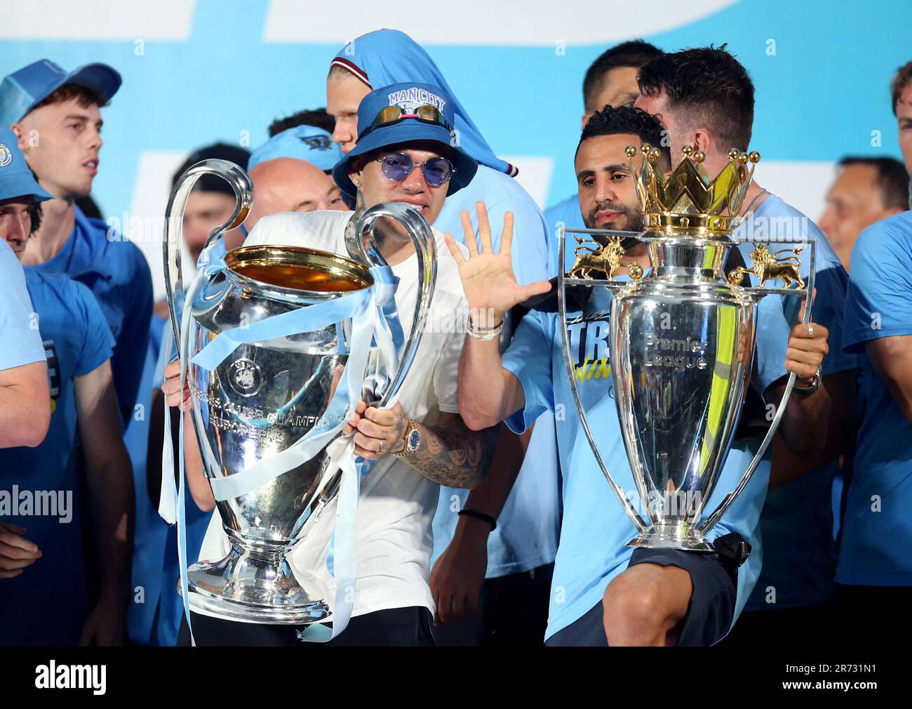 Manchester City goalkeeper Ederson (left) and Riyad Mahrez celebrate on ...