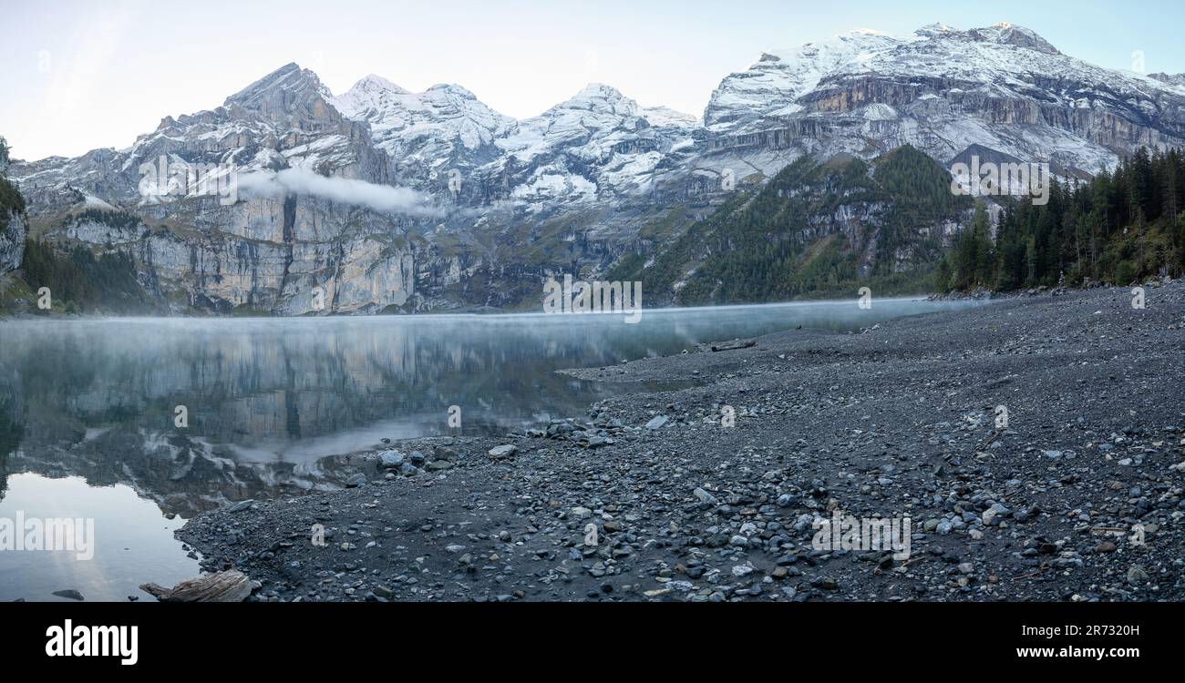 A stunning view of Lake Oeschinensee and the majestic Alps in ...