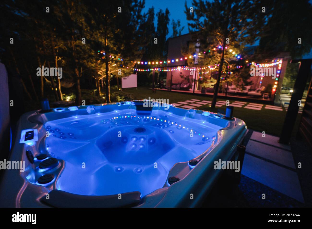 autonomous hot tub or jacuzzi with hot water and evening lighting Stock ...