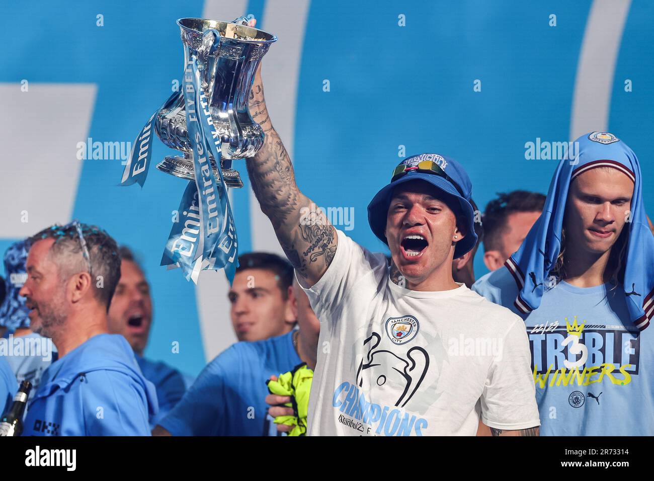 Ederson #31 of Manchester City lifts the Champions league Trophy and ...