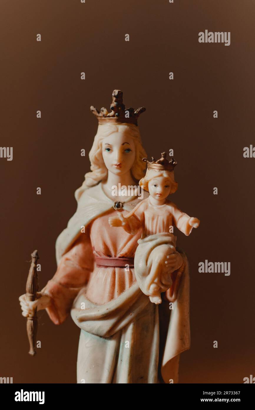 lady helper holding baby Stock Photo - Alamy