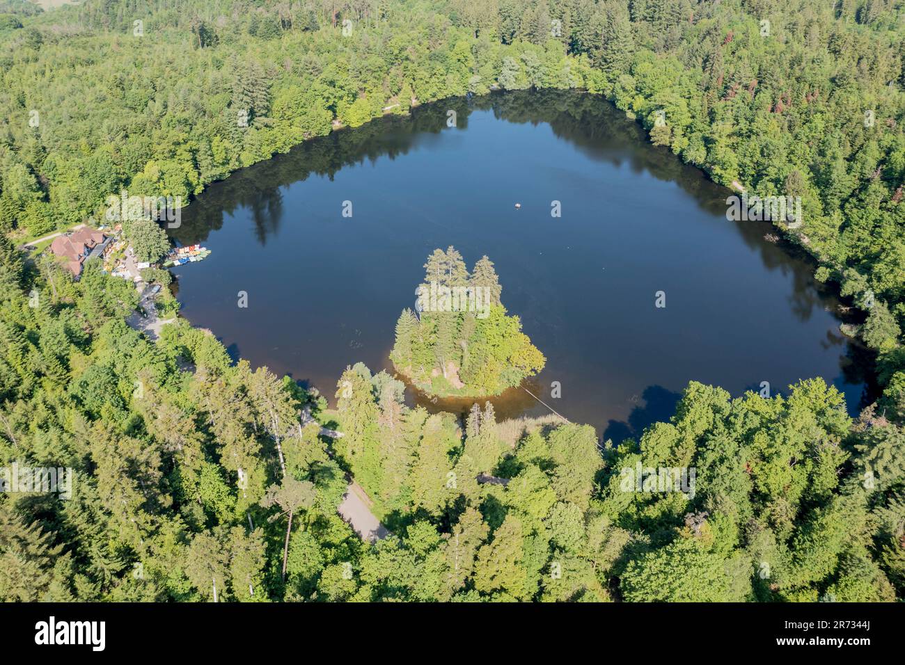 Lake Bergsee ('mountain lake') near Bad Saeckingen, idland in the lake ...