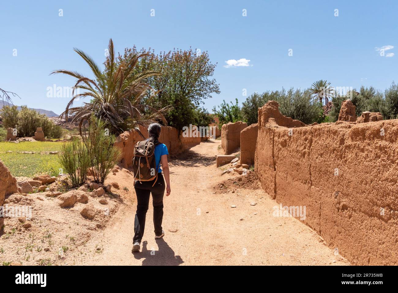 Hiking through the scenic Tafraoute valley in the Anti-Atlas mountains ...