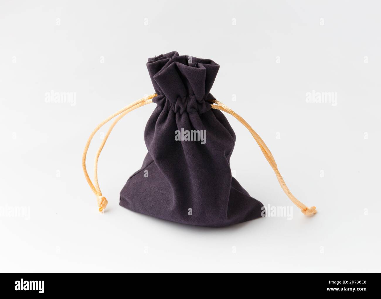 Soft velor fabric pouch with drawstring isolated on white background ...