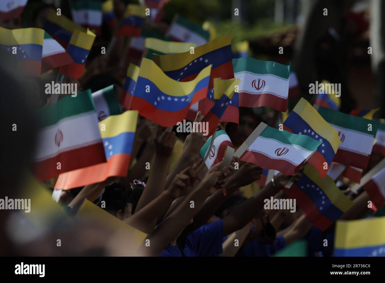 People wave iranian flags hi-res stock photography and images - Alamy