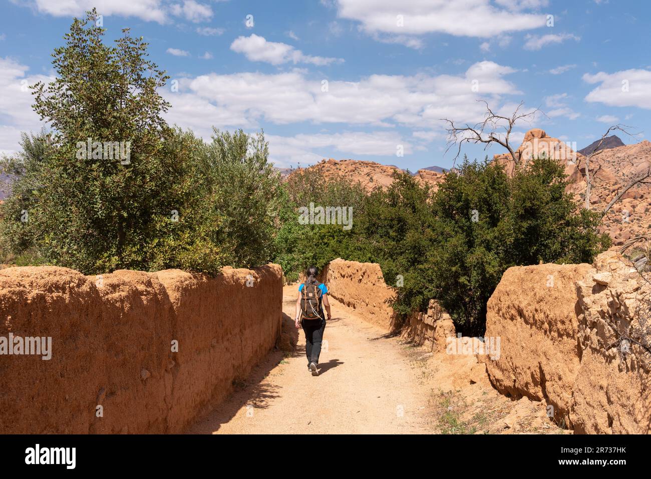 Hiking through the scenic Tafraoute valley in the Anti-Atlas mountains ...