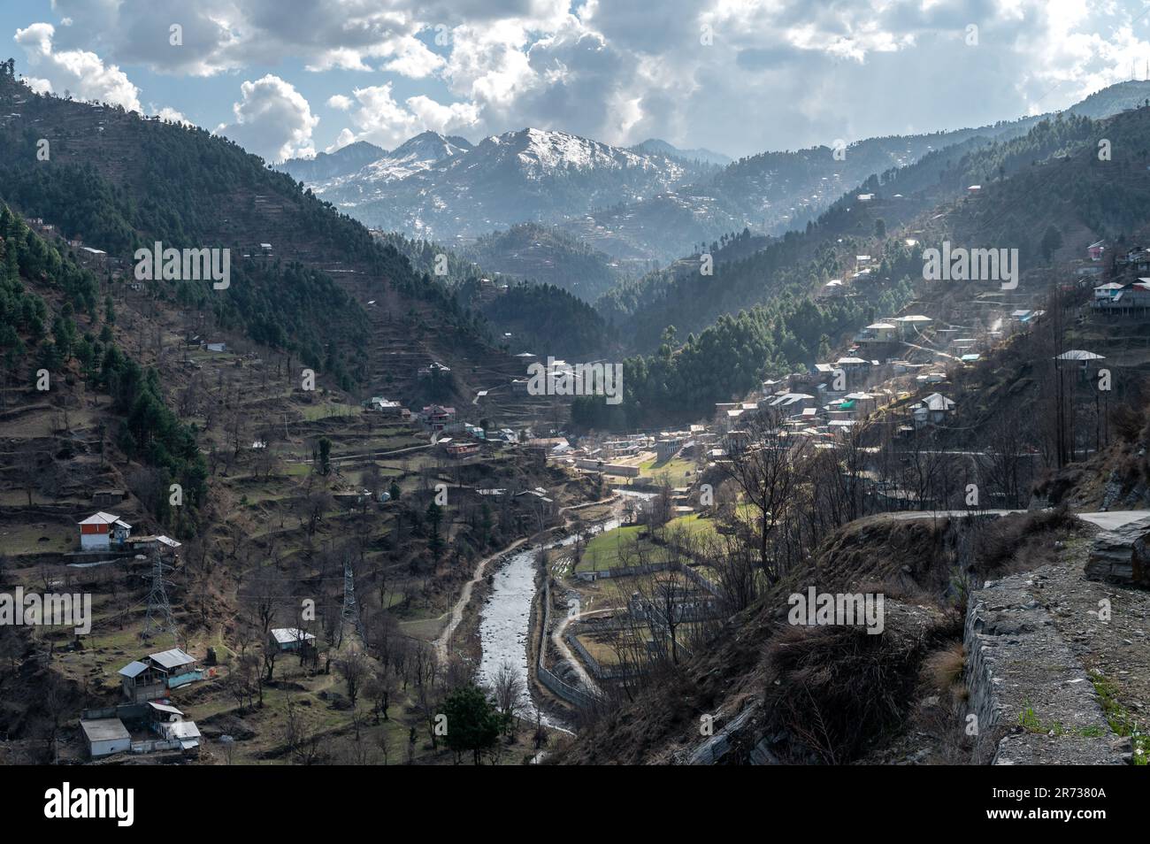 Upper Swat Valley landscape and houses built in layers with cloudy ...