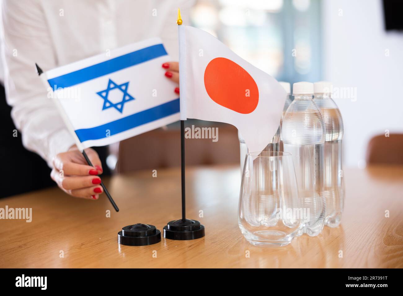National flags of Japan and Israel on table in meeting room Stock Photo ...
