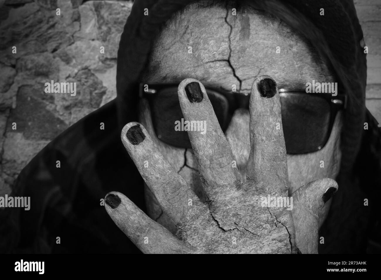 a close up of a stone man in black and white Stock Photo - Alamy