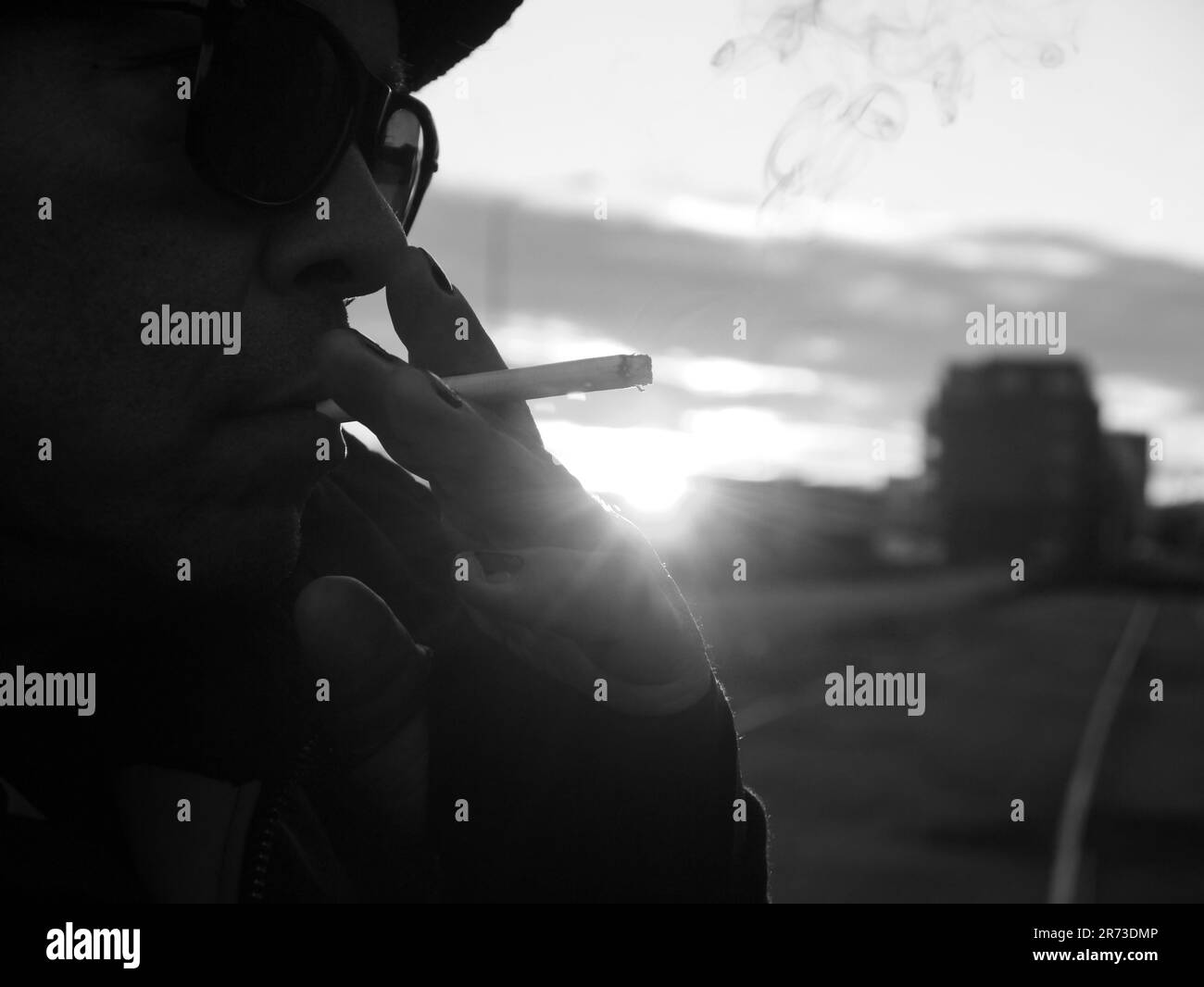 Silhouette of man looking at sunset Black and White Stock Photos ...