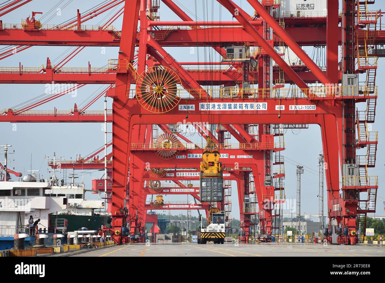 NANJING, CHINA - JUNE 12, 2023 - Trucks deliver containers at the ...