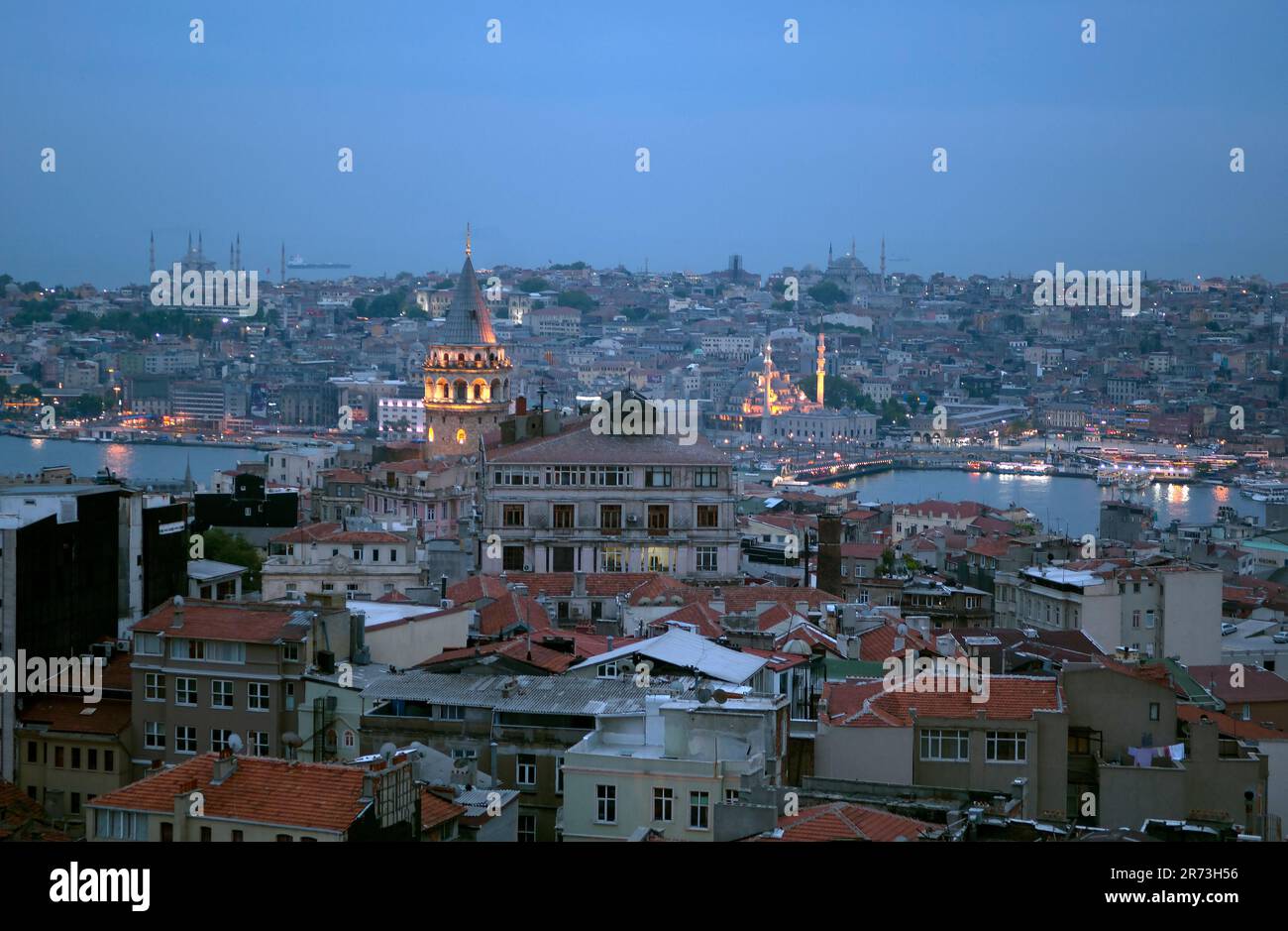 Rooftop view at dusk of the Galata Tower with the Blue Mosque and Hagia ...