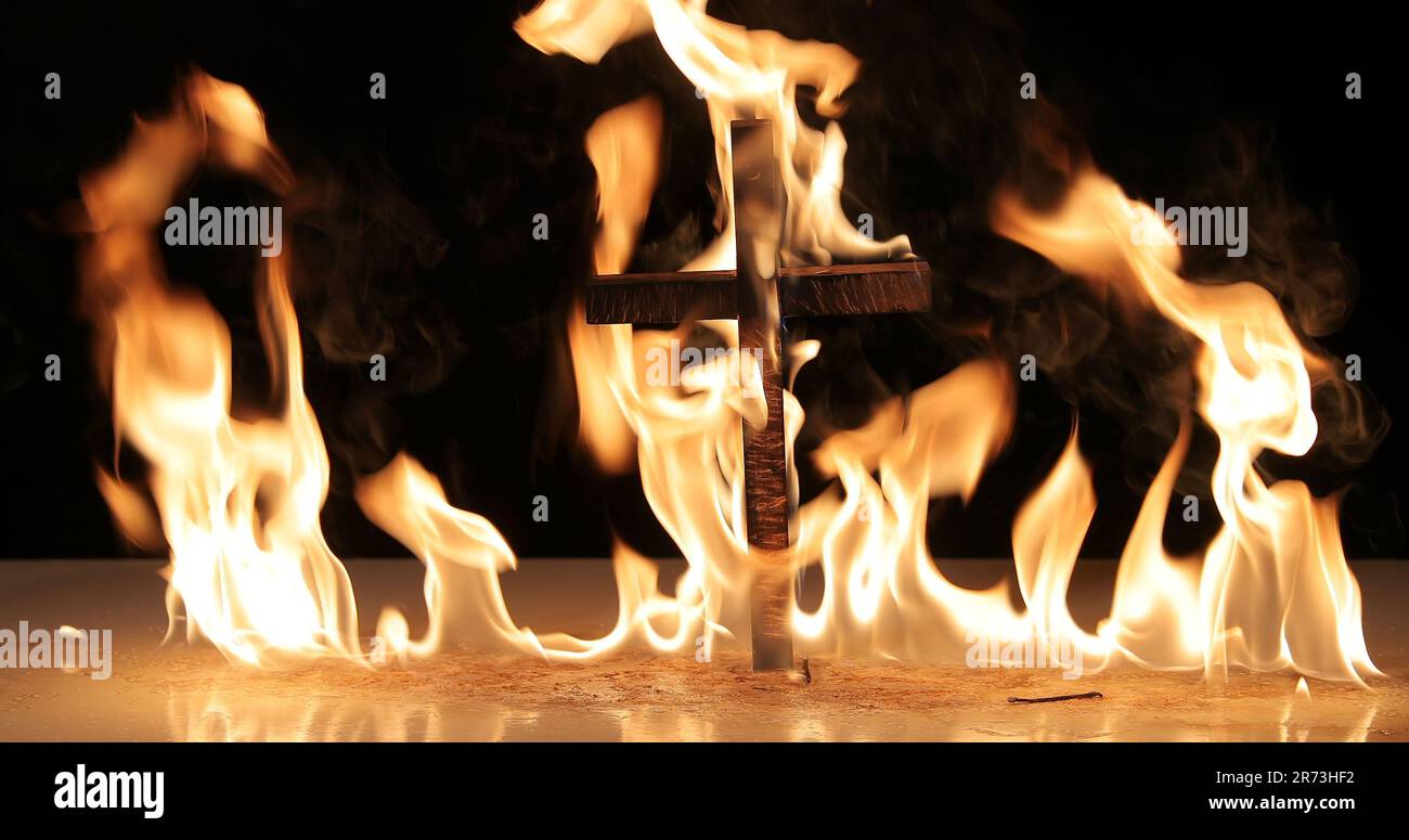 Fire around a burning cross symbol Stock Photo - Alamy