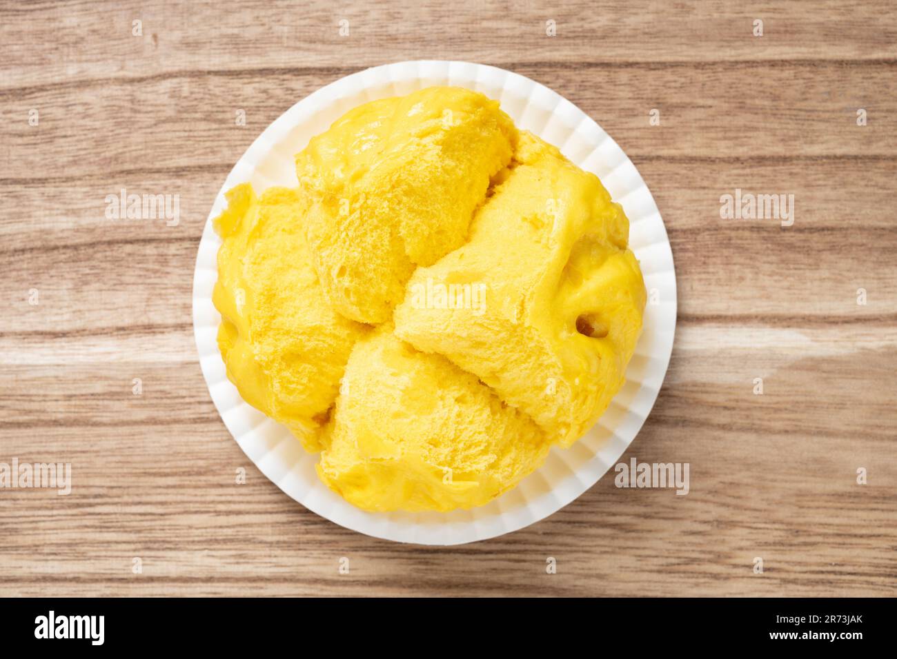 top view Chinese style yellow color steamed bun Stock Photo - Alamy