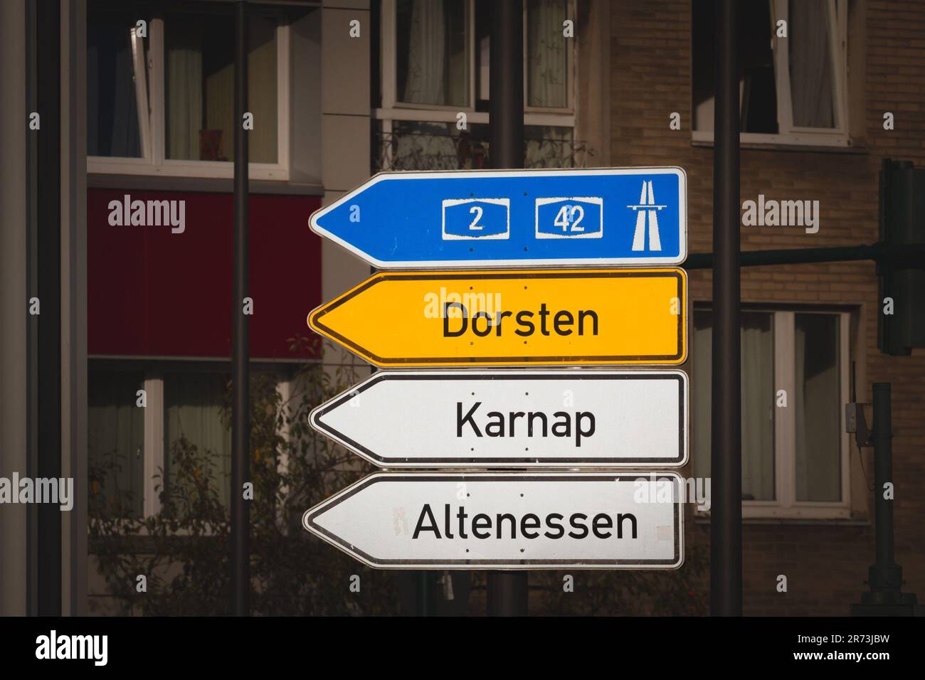 Picture of a german roadsign indicating various directions, notably the ...