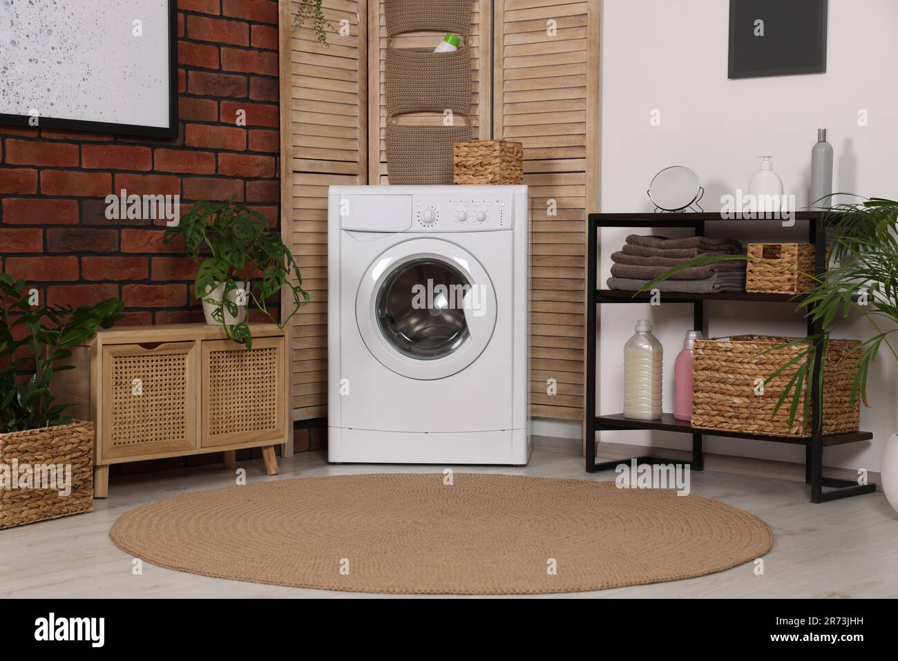Stylish laundry room with washing machine. Interior design Stock Photo ...