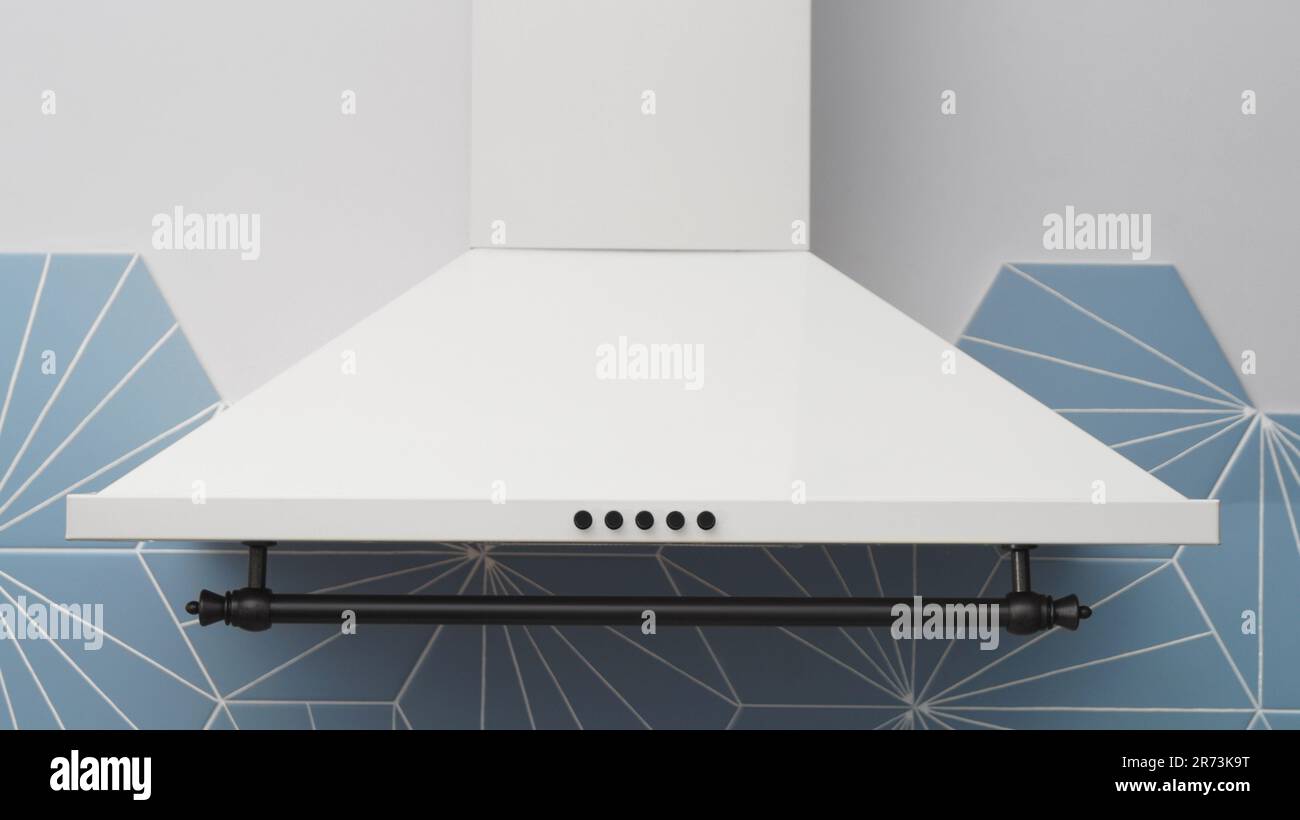 Modern white electric exhaust hood in kitchen Stock Photo - Alamy